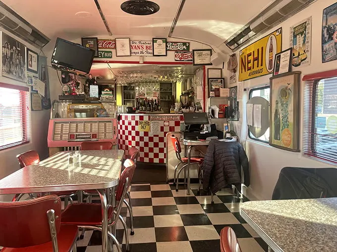 Step inside and be transported to the nifty fifties! This cozy interior is a feast for the eyes, with vintage signs that'll have you doing the twist in your seat.