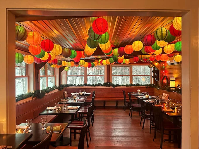Step into a kaleidoscope of culinary delight! Krista's dining room dazzles with vibrant lanterns, creating an atmosphere as warm as their welcome.