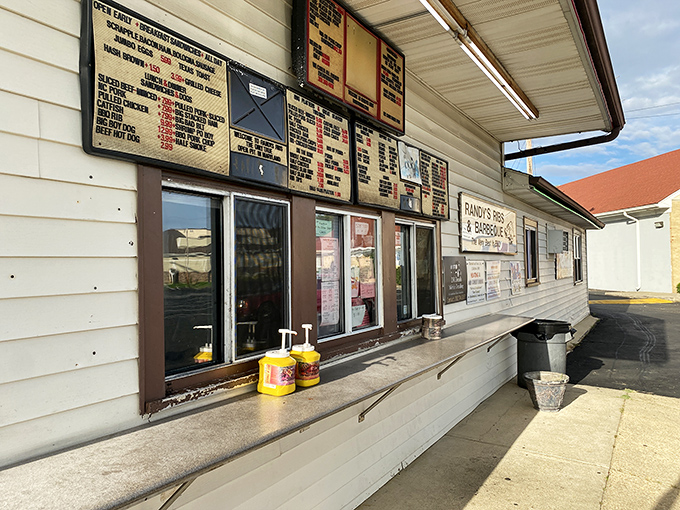 Order up! This menu board is like a treasure map, guiding you to mouthwatering ribs and sides that'll make your taste buds dance.