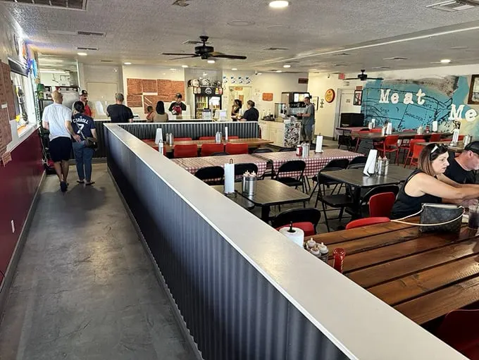 Inside, red-checkered tablecloths and corrugated metal create the perfect backdrop for the serious business of Texas-style meat appreciation.