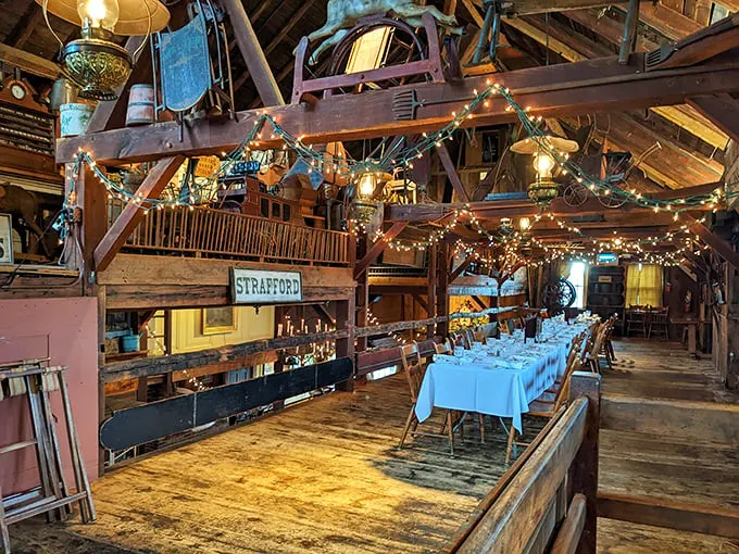 Step into a dining room that's part rustic charm, part fairy tale. With twinkling lights and exposed beams, it's like eating in a colonial-era treehouse – minus the splinters.