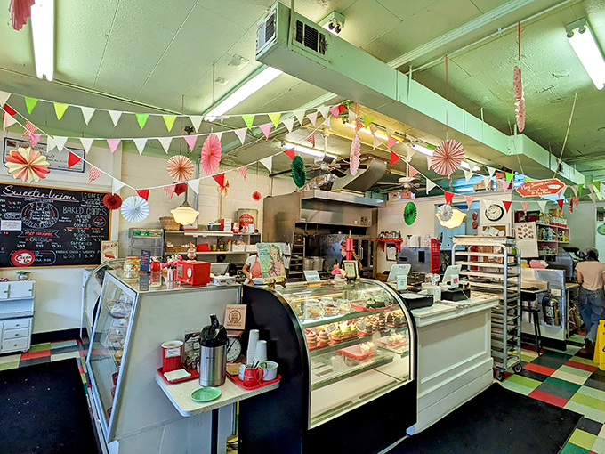 Whimsical wonderland alert! This isn't just a bakery; it's a time machine disguised as a dessert haven. Checkered floors and vintage vibes galore!