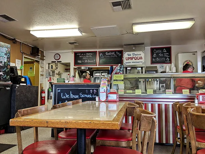 Step into a time warp where burgers reign supreme and calories don't count. The menu board tempts with promises of deliciousness.