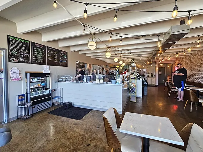 Step into donut paradise! The interior of East Park is a symphony of warm lighting, inviting aromas, and tantalizing displays. It's where calories come to dance!