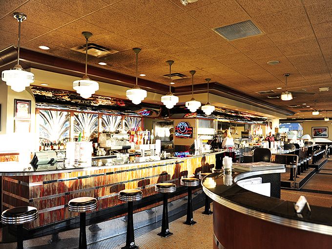 Welcome to the land of chrome and dreams! This counter isn't just for eating – it's front-row seats to the greatest show on earth: breakfast in the making.