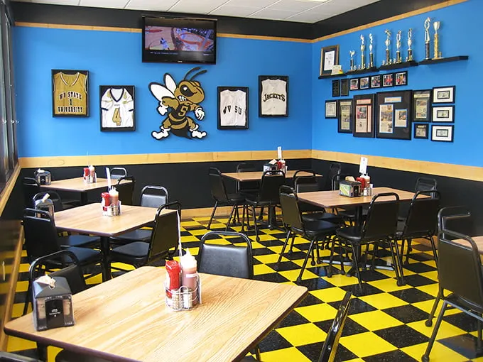 Sports and BBQ: a match made in heaven. This blue and gold dining room is where Mountaineer fans come to fuel up.