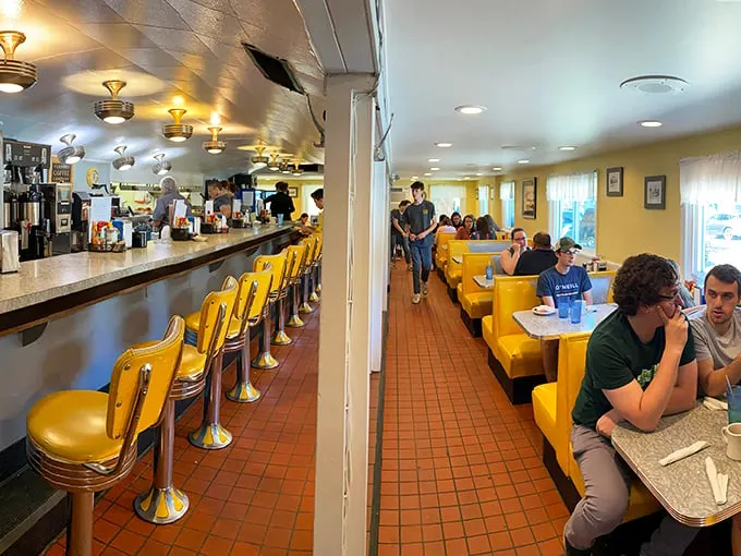 Yellow booths and chrome stools: Henry's interior is a symphony of nostalgia that'll have you humming "Happy Days" in no time.