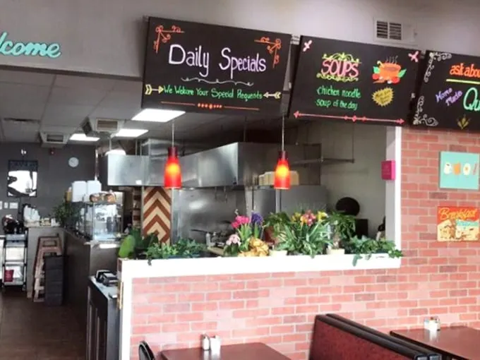 Step into a time machine of taste! The chalkboard specials and brick accents transport you to a simpler era of comfort food perfection.