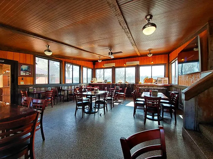 Step inside and feel the warmth – both from the wood-paneled walls and the promise of smoky delights to come.