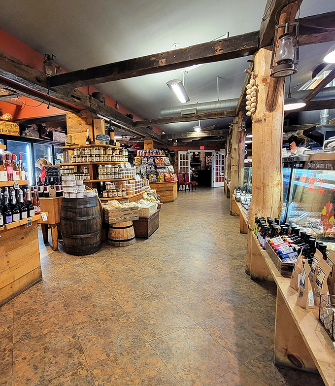 Wooden beams, rustic barrels, and gourmet provisions line the butchery section—this isn't shopping, it's a spiritual experience for food lovers.