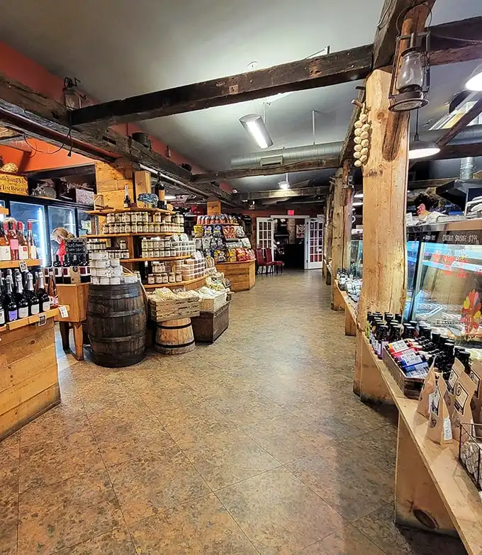 Wooden beams, rustic barrels, and gourmet provisions line the butchery section—this isn't shopping, it's a spiritual experience for food lovers.
