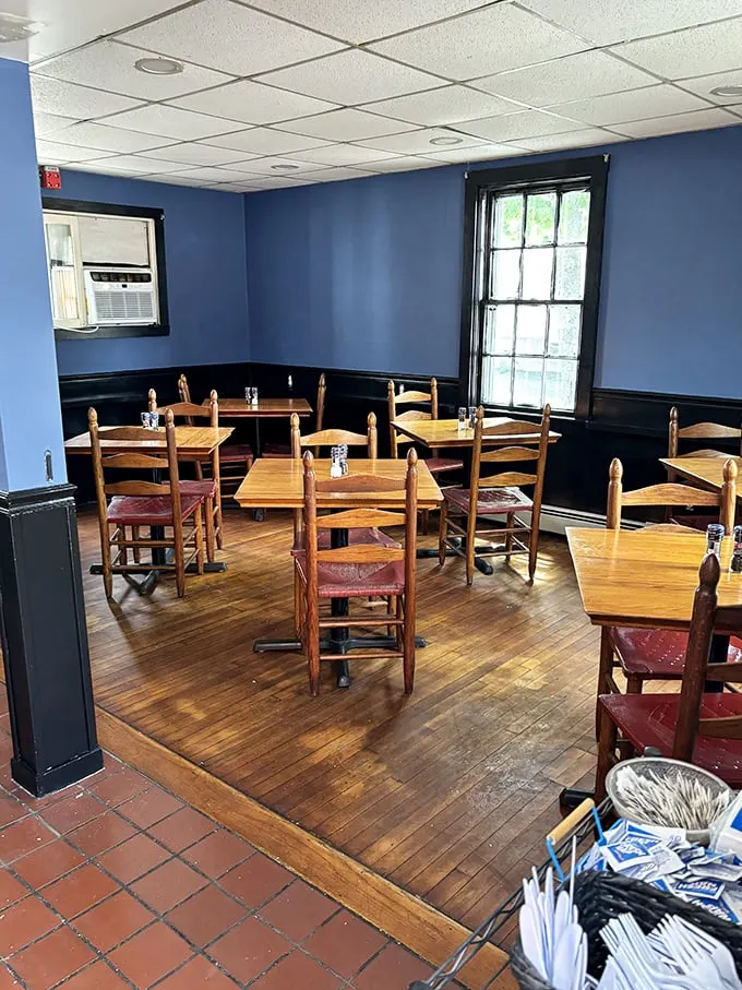Step into flavor town! This cozy dining room is where BBQ dreams come true, and napkins become your new best friend.