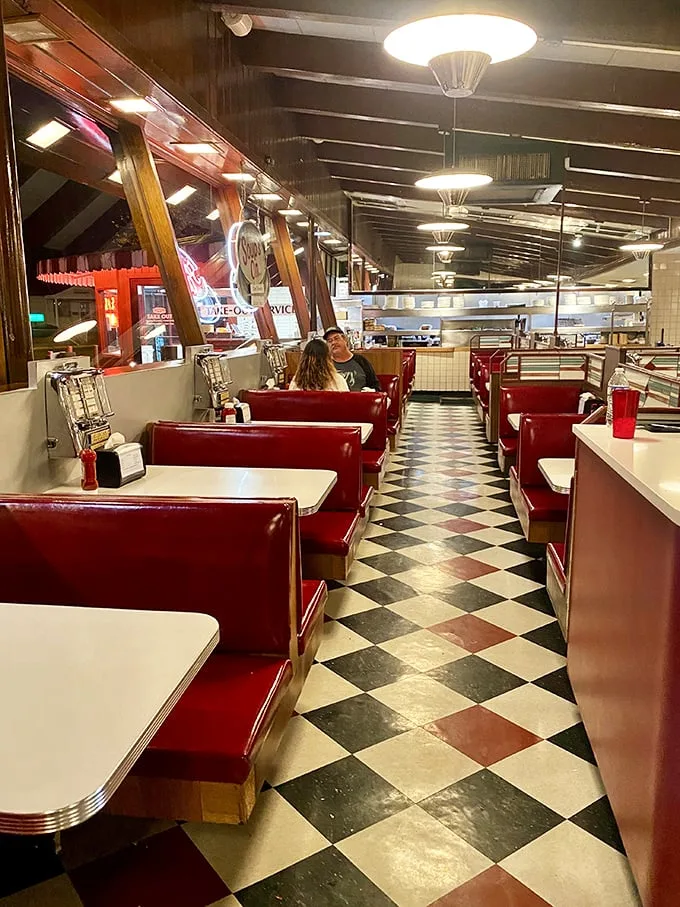 Step inside and travel back in time! Red vinyl booths and a checkerboard floor set the stage for a dining experience that's pure Americana on a plate.