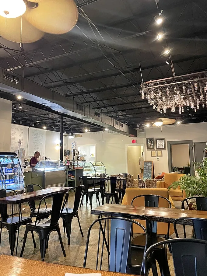 Step into a world where industrial chic meets cozy charm. This inviting space is the perfect backdrop for your pastry-fueled daydreams.