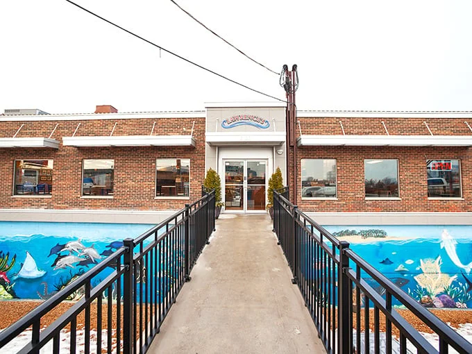 Lawrence's Fish & Shrimp: The late-night hero we deserve! That giant shrimp sign isn't compensating – it's a promise of colossal flavor.