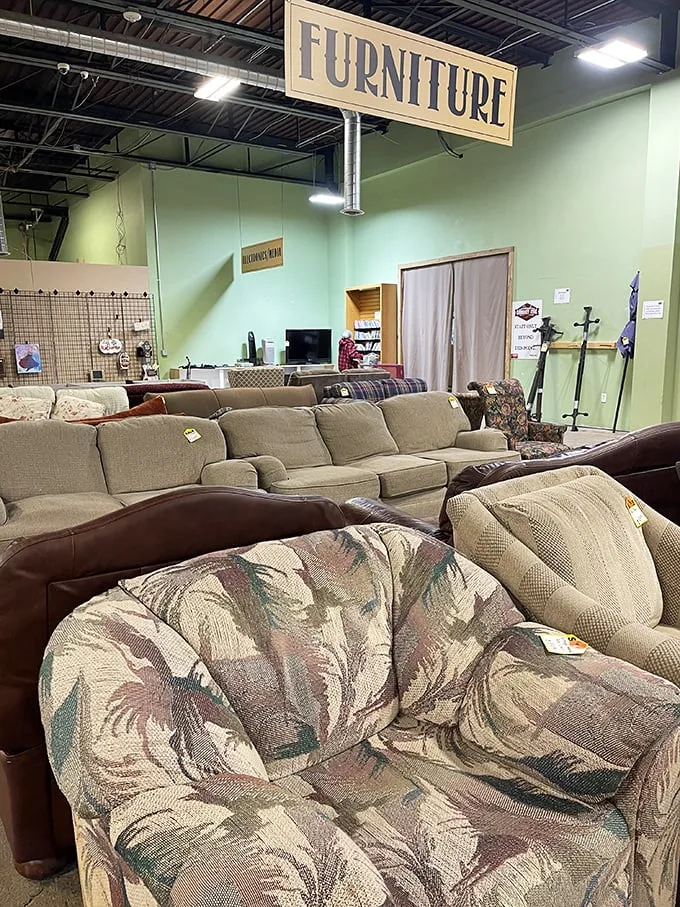 Sofa, so good! This furniture section is like a cozy time capsule. That floral armchair looks ready to spill the tea on decades of family drama.