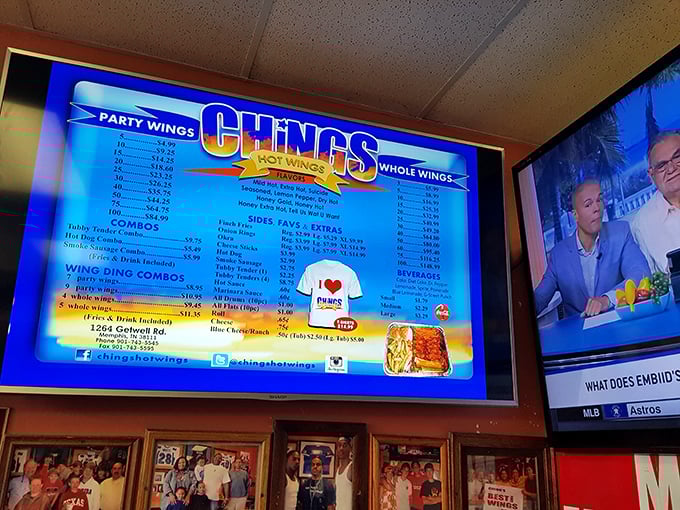The illuminated menu board tells you everything you need to know—from "mild" to "suicide," your taste buds are in for an adventure.