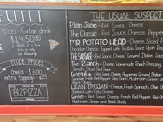 Behold, the sacred texts! This chalkboard menu is a roadmap to culinary bliss, with each option more tempting than the last.