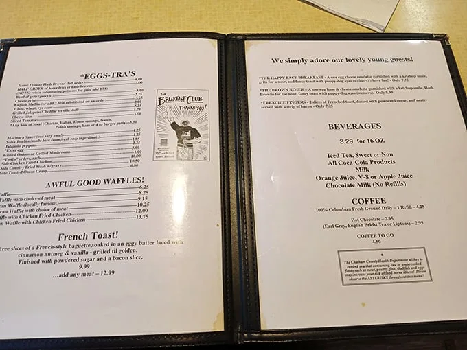 A menu that reads like a love letter to breakfast. From "Egg-stras" to "Awful Good Waffles," each dish promises a delicious adventure.