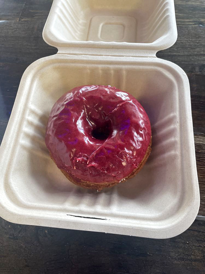 Behold the boysenberry beauty! This purple powerhouse looks like it could be the love child of Barney and a jelly donut.