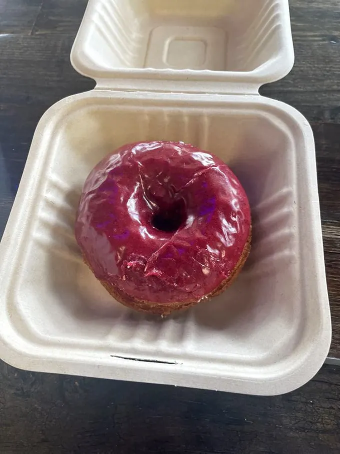Behold the boysenberry beauty! This purple powerhouse looks like it could be the love child of Barney and a jelly donut.