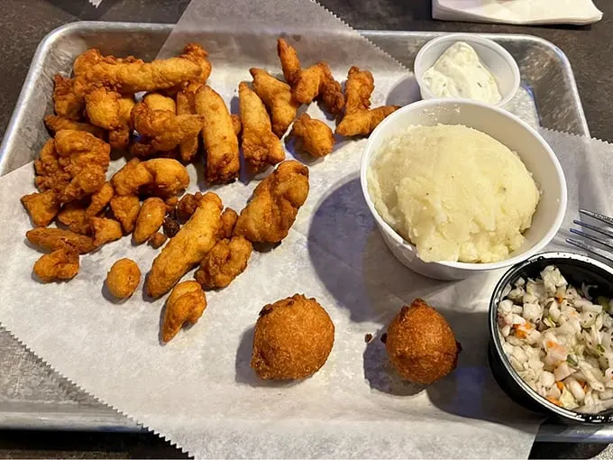 Golden nuggets of the sea! These crispy clam strips are like Neptune's version of potato chips – impossibly addictive and perfect for sharing.