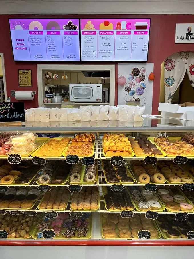 Donut nirvana achieved! This display case is the stuff of dreams, offering a kaleidoscope of flavors that would make Willy Wonka jealous.
