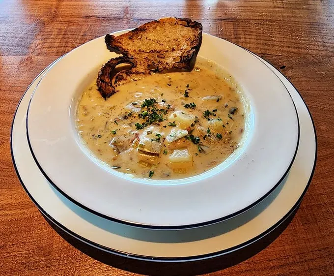 Ahoy, chowder lovers! This bowl of creamy New England clam chowder is so hearty, it could make a sailor forget about the sea.