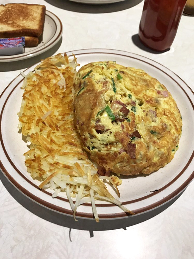 Fluffy, golden, and packed with flavor – this omelet is the breakfast equivalent of a warm Hawaiian sunset. Who needs a postcard when you can have this?