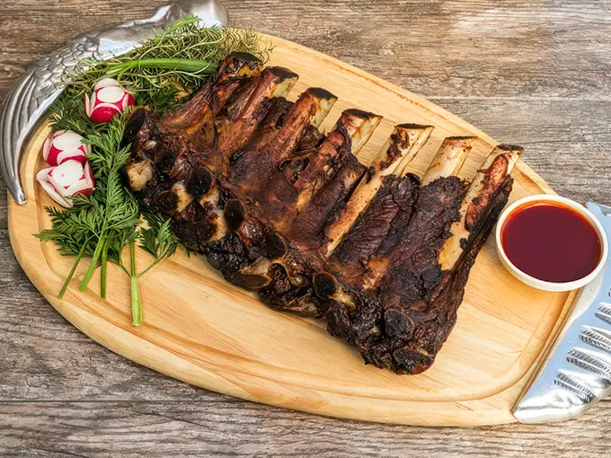 Holy smokes, Batman! These beef ribs are so massive, they might have their own zip code. Tender, juicy, and packed with flavor.