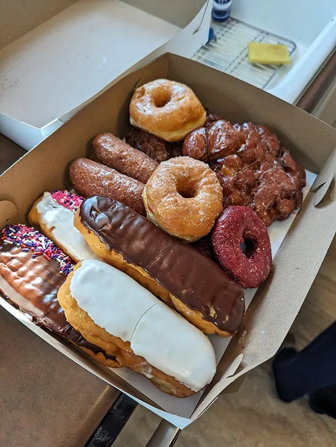 Donut nirvana in a box! It's like someone took all your childhood dreams and deep-fried them to golden perfection.