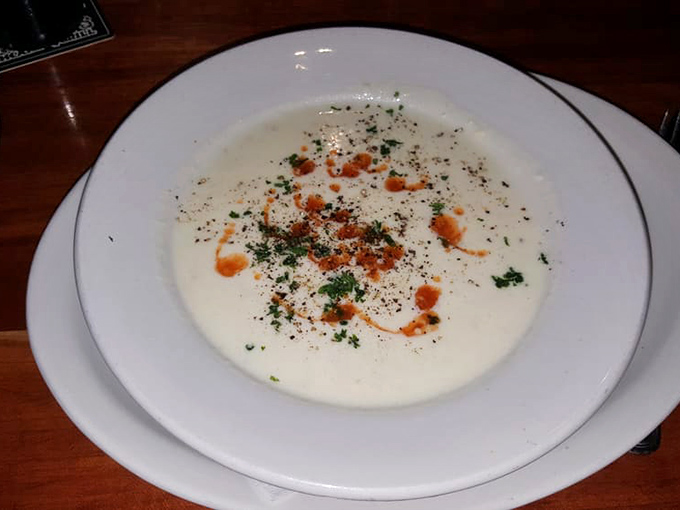 Creamy, dreamy, and oh-so-steamy! This New England Clam Chowder looks like a warm hug in a bowl.