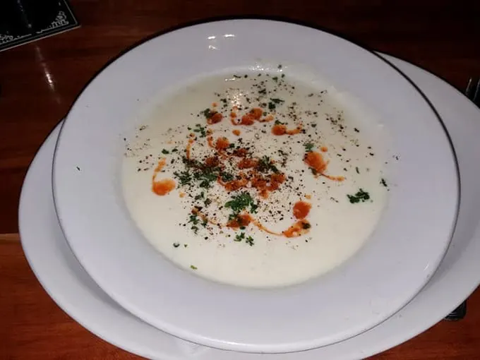 Creamy, dreamy, and oh-so-steamy! This New England Clam Chowder looks like a warm hug in a bowl.