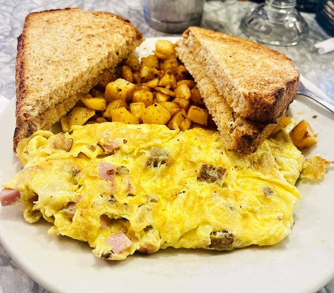 Behold, the Vermont Cheddar omelet! It's so cheesy, even your dad jokes will seem sharp in comparison.