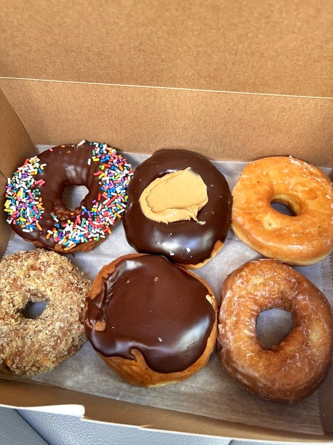 Donut heaven in a box! These circular wonders are the stuff dreams are made of. Sprinkles, chocolate, glazed – oh my! Diets, beware: resistance is futile.