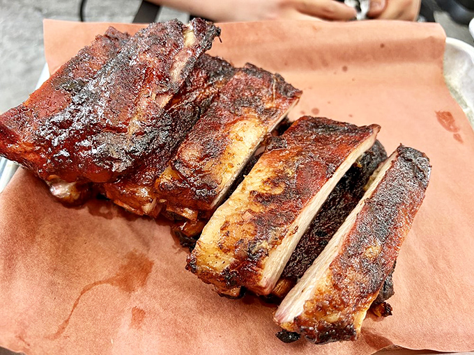 These ribs don't just fall off the bone—they practically leap into your mouth. The bark alone should be considered a national treasure.