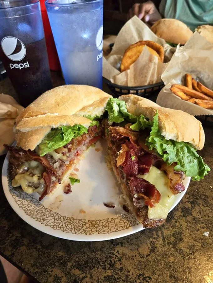 Warning: This bacon cheeseburger may cause involuntary drooling. It's not just a sandwich, it's a flavor explosion waiting to happen. Napkins are your new best friend.