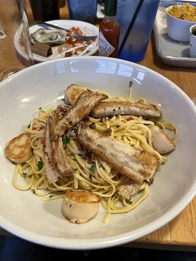 A pasta paradise with a seafood twist! This dish is what happens when Italian comfort food goes on a beach vacation.