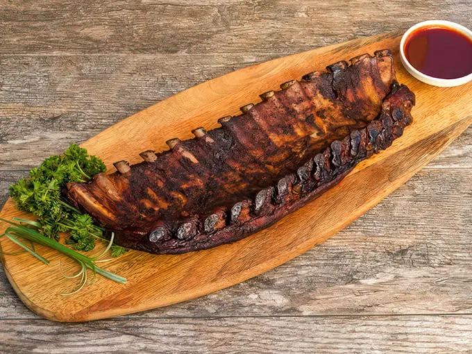 Baby got back… ribs! These beauties are the Goldilocks of barbecue - not too big, not too small, but just right for finger-licking goodness.