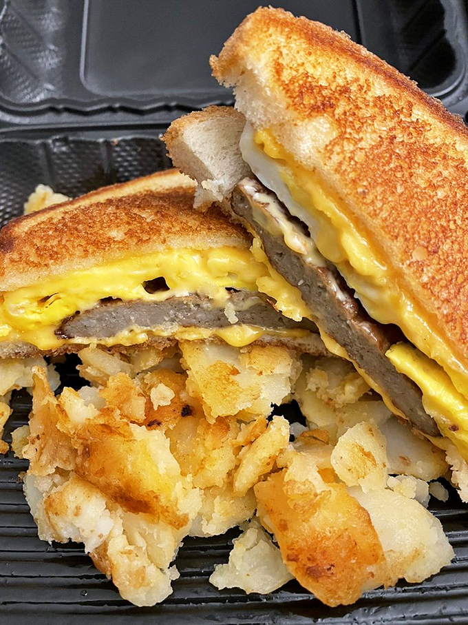 The breakfast sandwich that puts your sad desk lunch to shame. Layers of gooey cheese and savory sausage nestled between golden, crispy bread – a morning game-changer!
