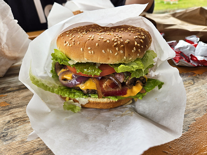 Cheese Louise! This burger's got more layers than a Shakespeare play, and twice the drama in flavor.