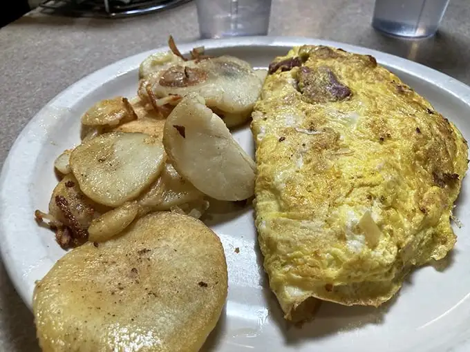 Corned beef omelet: where "I'll just have a bite" turns into "I can't believe I ate the whole thing." A delicious life lesson on a plate.