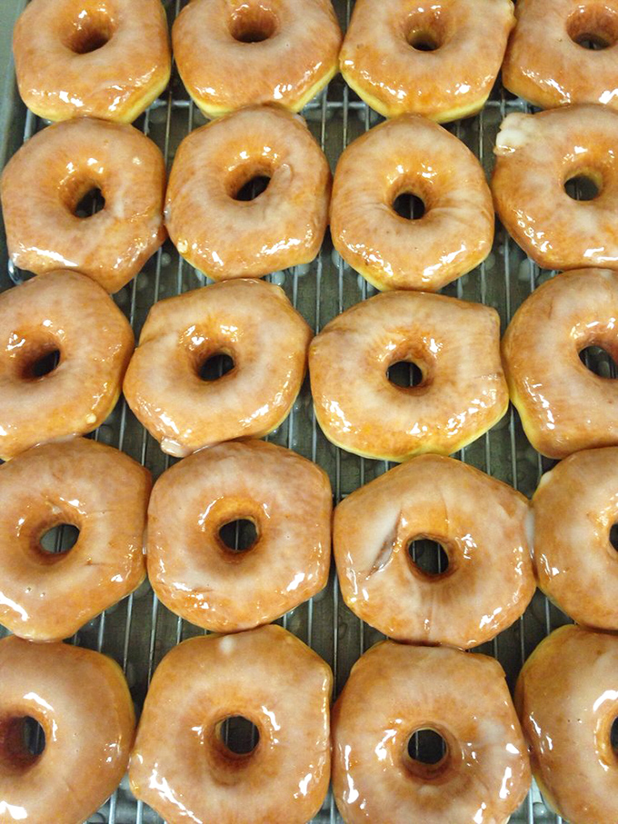 Behold, the humble glazed donut in all its glory. Simple, classic, and utterly irresistible – it's the little black dress of the pastry world.