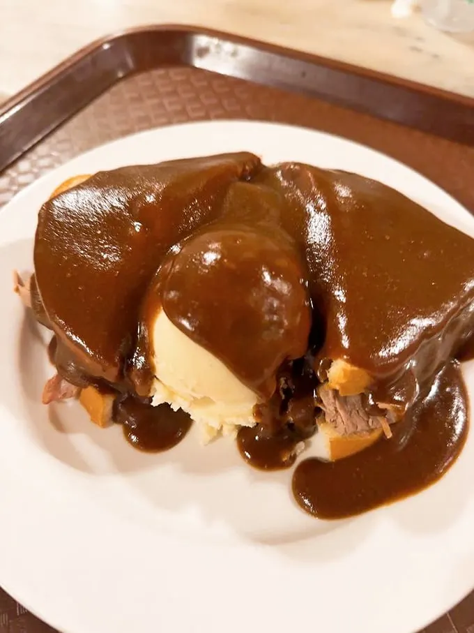 Behold, the hot beef sandwich – Wall Drug's answer to "What if gravy could hug?" It's comfort food so comforting, it practically tucks you in for a nap afterward.