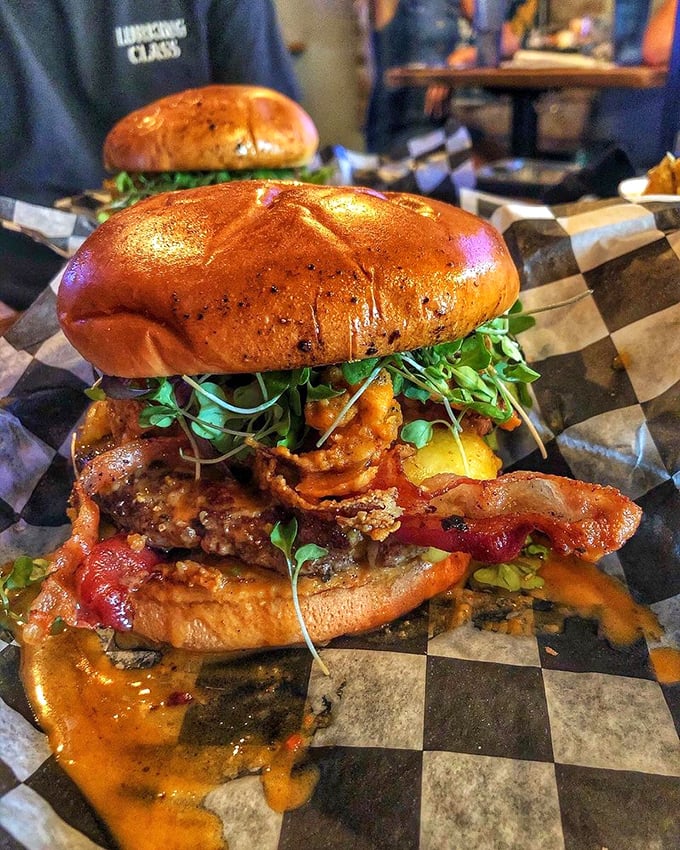 Talk about a flavor explosion! This burger looks like it could solve world peace, one juicy bite at a time.