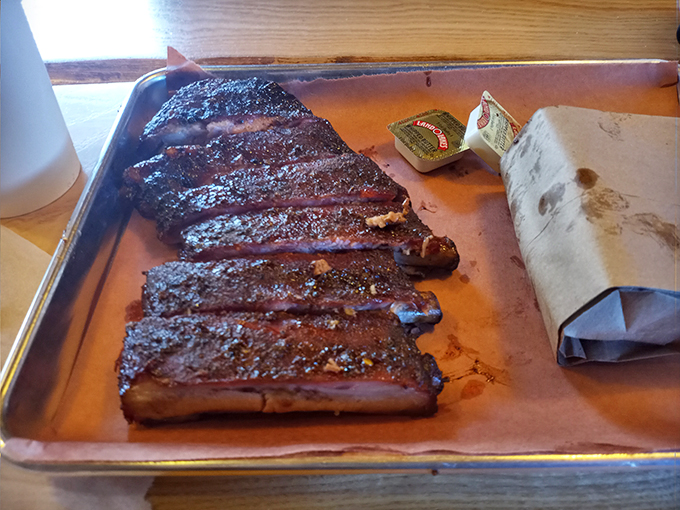 Baby got back... ribs! These beauties are the Mona Lisa of meat, with a smoke ring that could make a pit master weep.