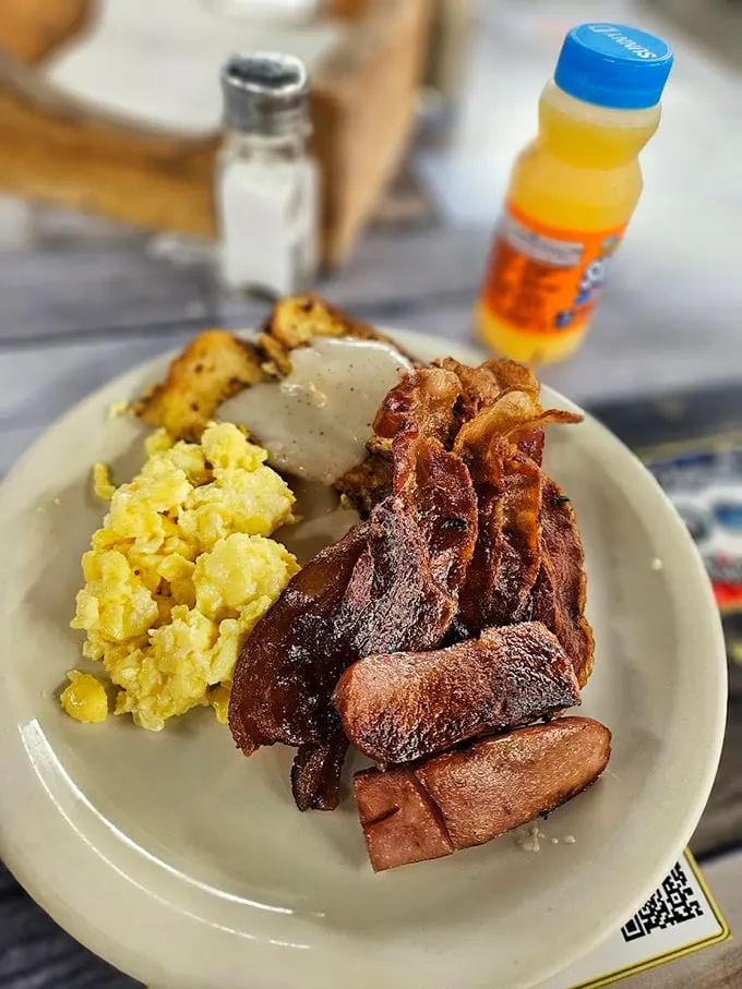 The breakfast of champions, or anyone who plans to skip lunch. Those bacon slices aren't just crispy—they're practically delivering a sermon on pork perfection.