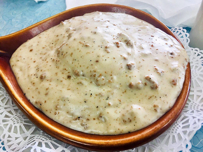 Not all heroes wear capes—some come in ceramic bowls, smothered in peppery gravy, ready to rescue you from hunger with country-style comfort.