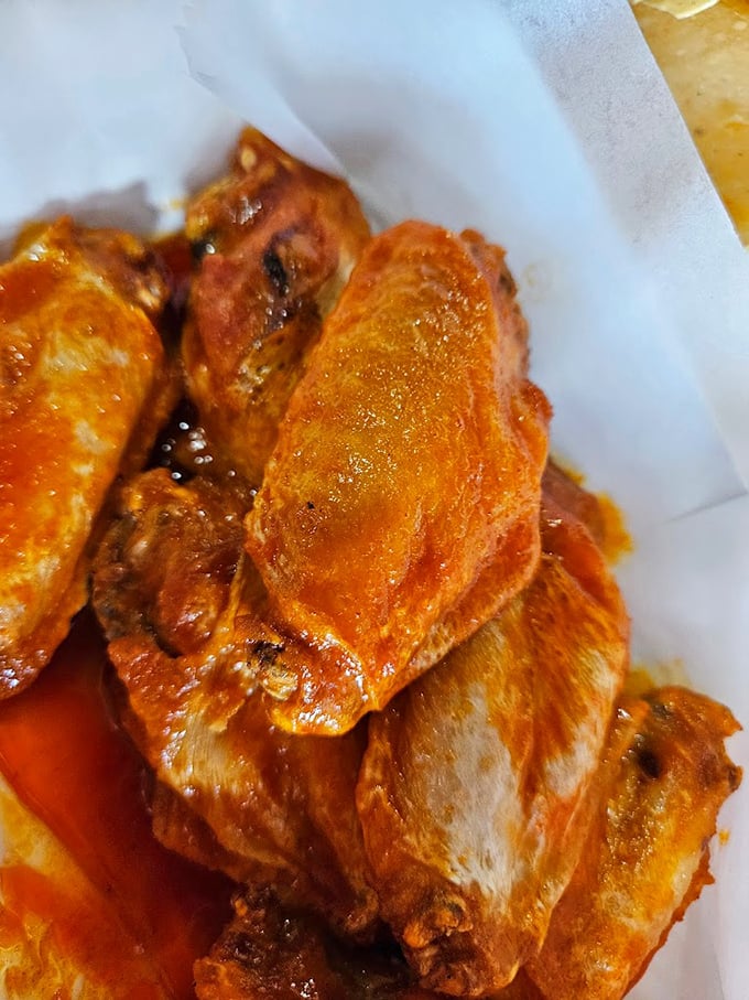 Close-up magic: These wings aren't just cooked—they're transformed. The caramelized edges and sauce-soaked skin are what food dreams are made of.