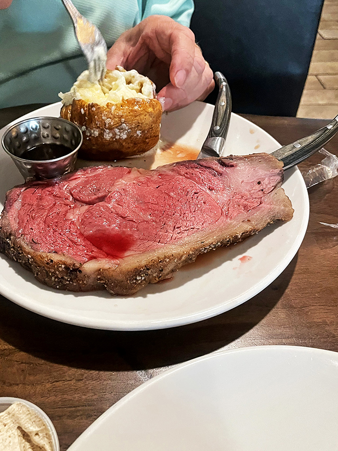 The classic prime rib: where 'medium-rare' meets 'medium-amazing'. This plate is a testament to the art of perfect timing and seasoning.